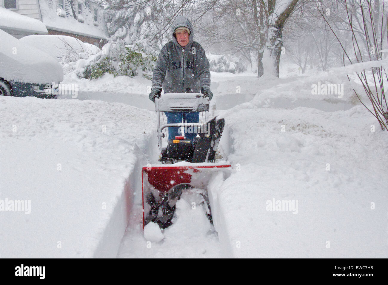 Snowblower slices through two feet of snow in suburban Washington DC ...