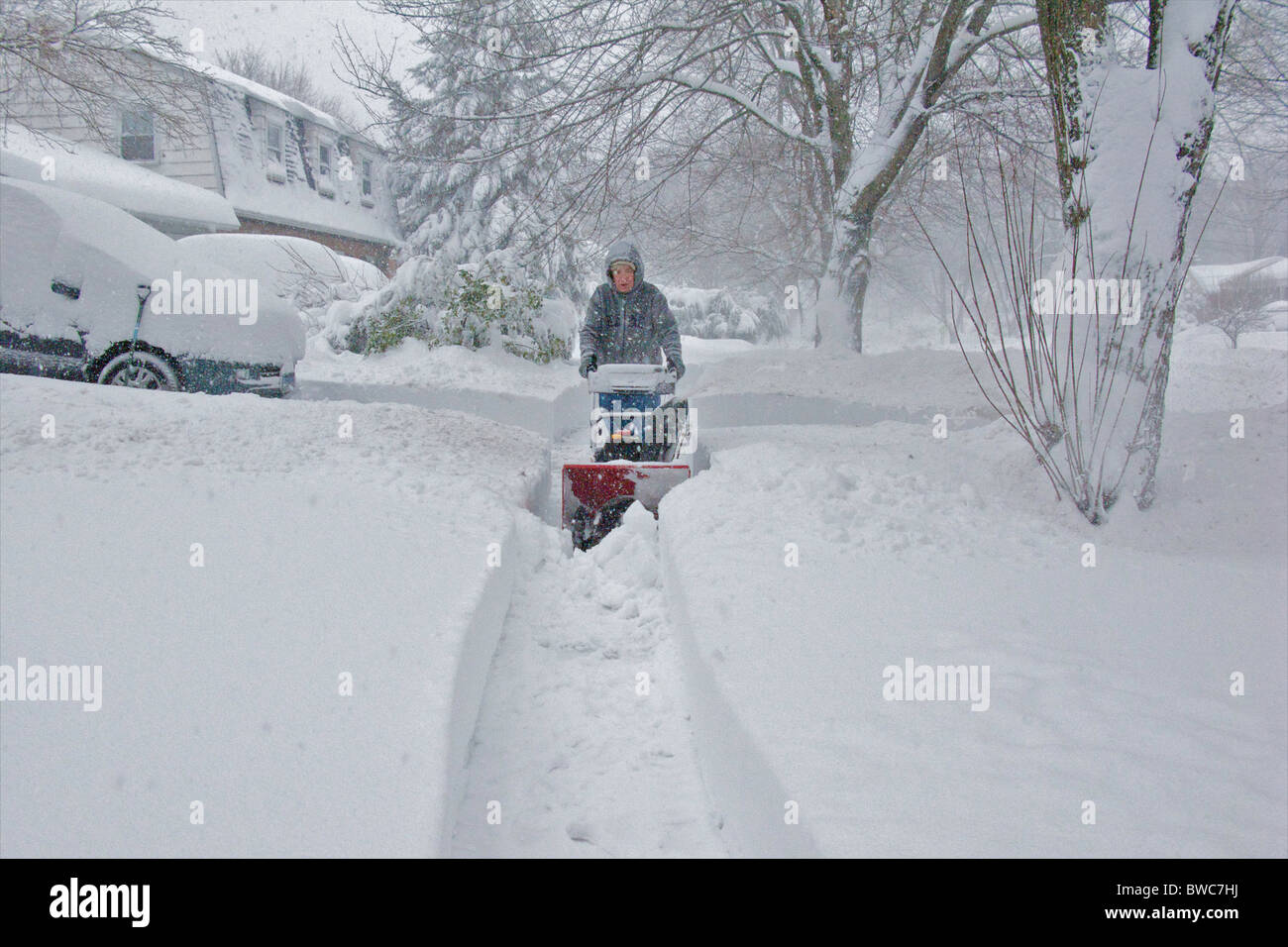Snowblower slices through two feet of snow in suburban Washington DC ...