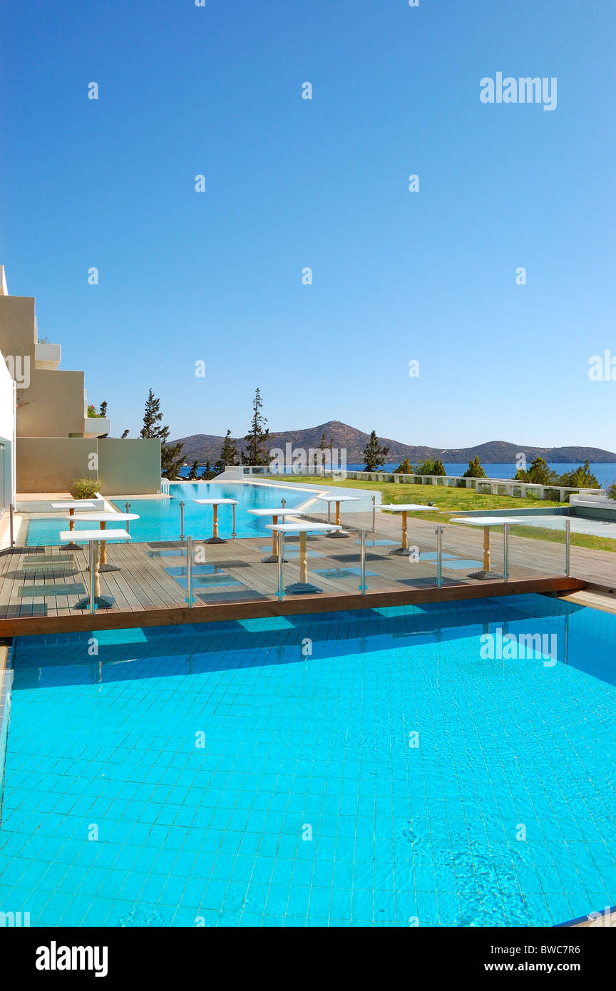 Restaurant and swimming pool at luxury hotel, Crete, Greece Stock Photo ...