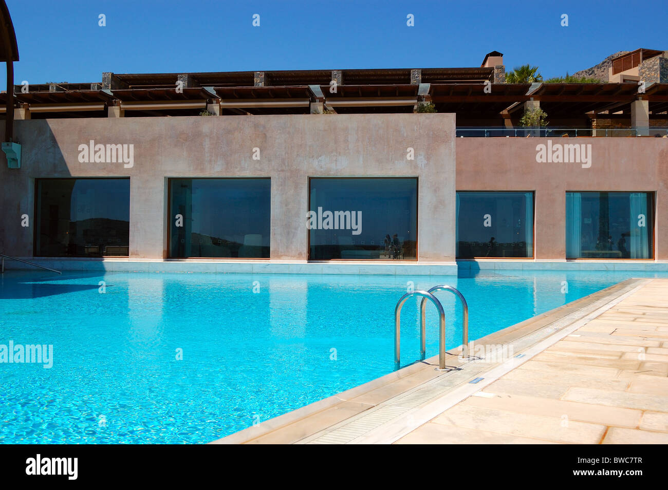 Swimming pool at modern luxury hotel, Crete, Greece Stock Photo - Alamy