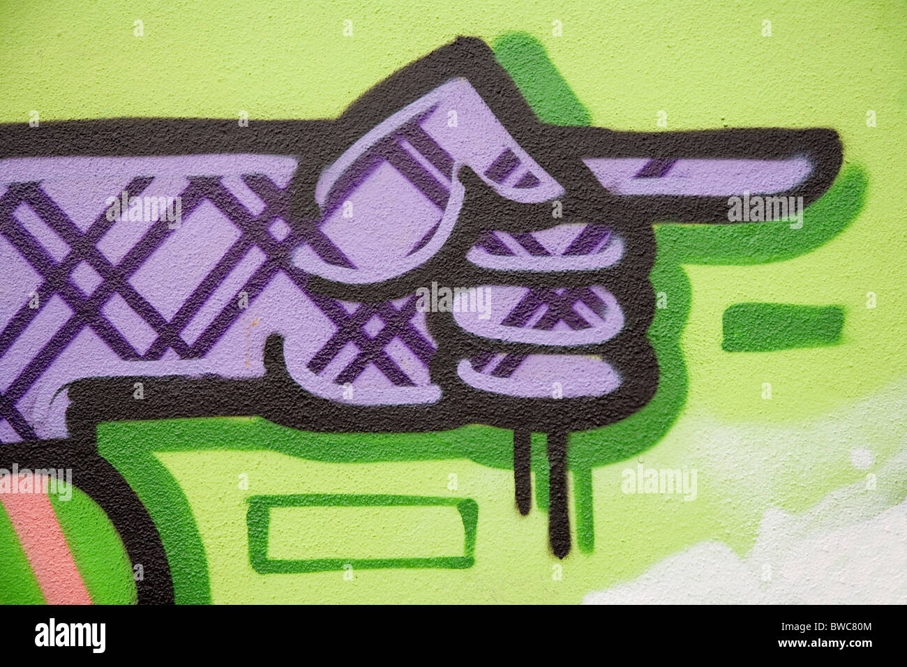 Graffiti: pointing hand Stock Photo - Alamy