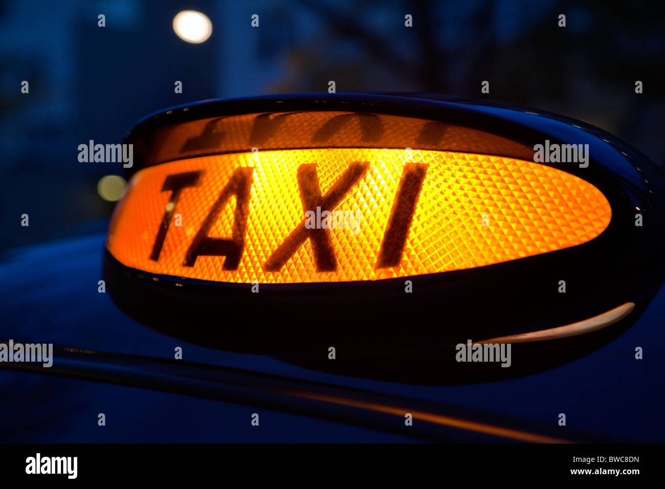 Yellow taxi sign Stock Photo - Alamy