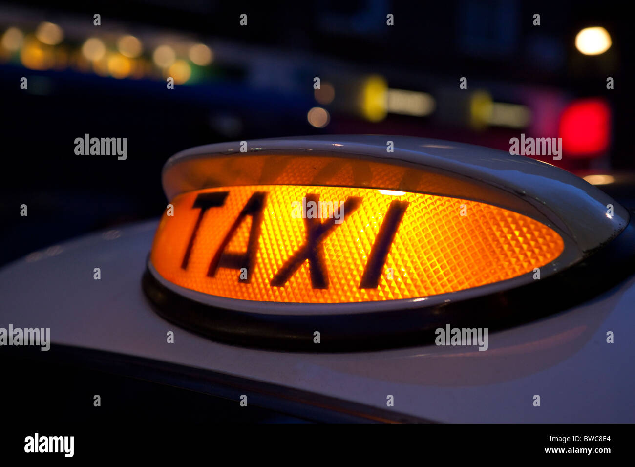Yellow taxi sign Stock Photo - Alamy
