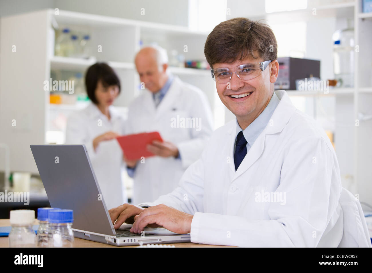 Scientist using laptop in hi-res stock photography and images - Alamy