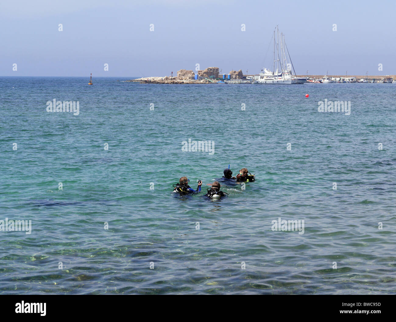 Divers in Paphos harbour in Cyprus Stock Photo - Alamy