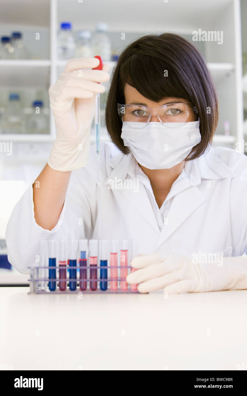 Female scientist doing research in laboratory, portrait Stock Photo - Alamy