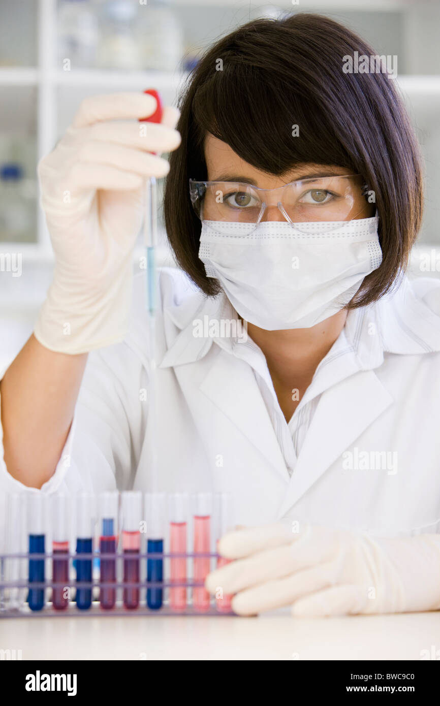 Female scientist doing research in laboratory, portrait Stock Photo - Alamy