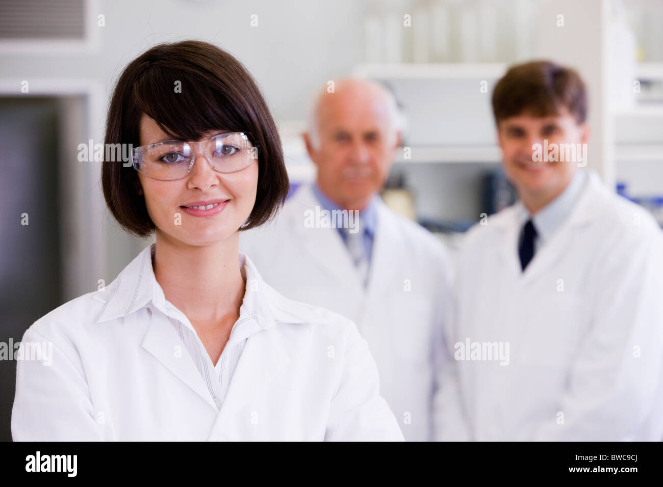 Three scientist in laboratory, portrait Stock Photo - Alamy
