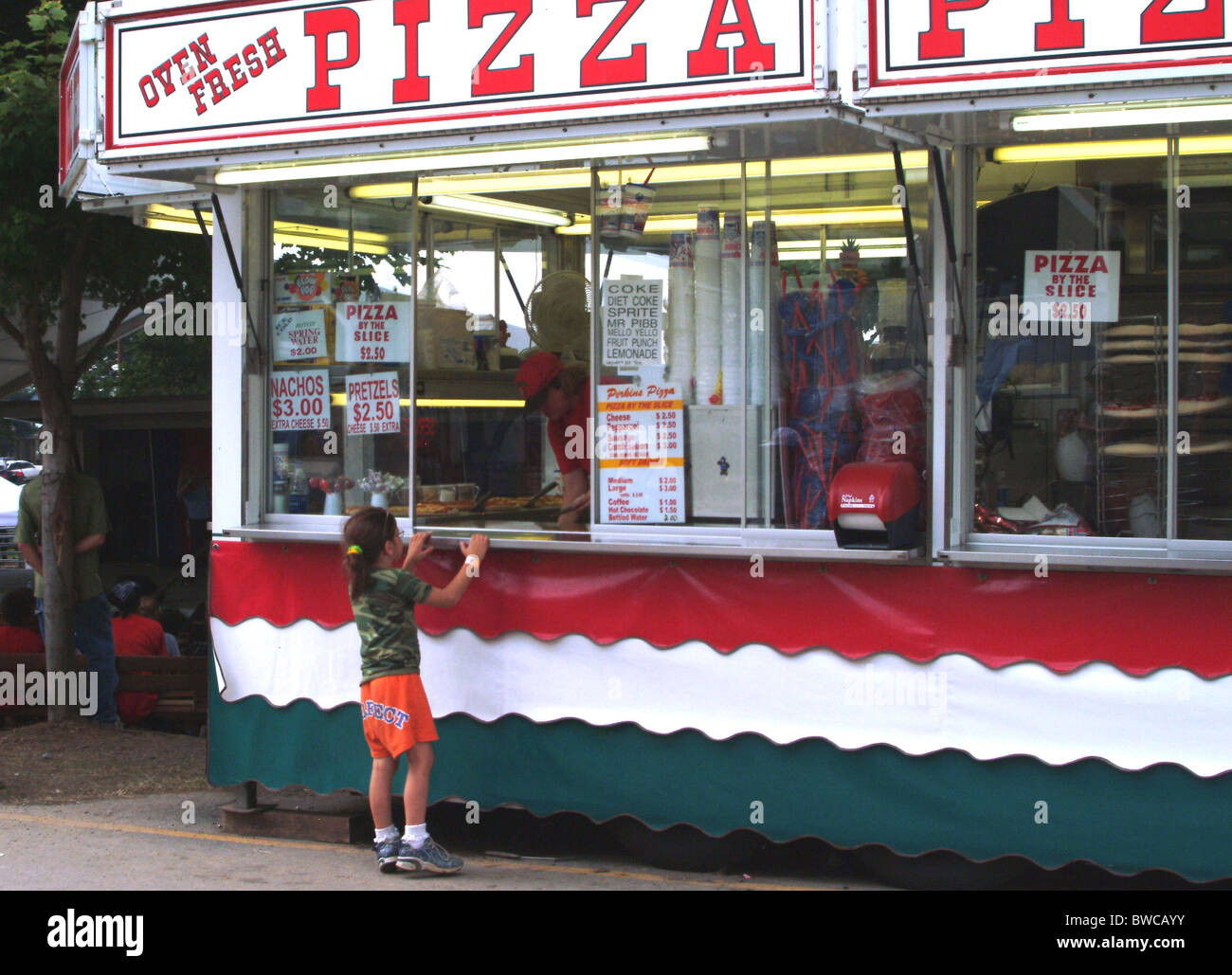 child gets refreshments at vendor at the Montgomery County Fair in ...