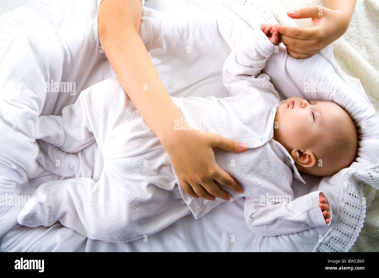 Cradle in arm hi-res stock photography and images - Alamy