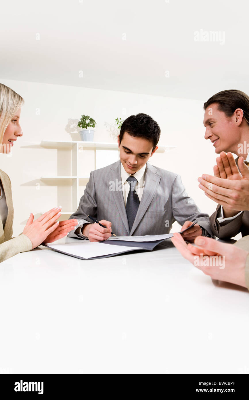 Photo of successful businessman signing contract with promising company ...