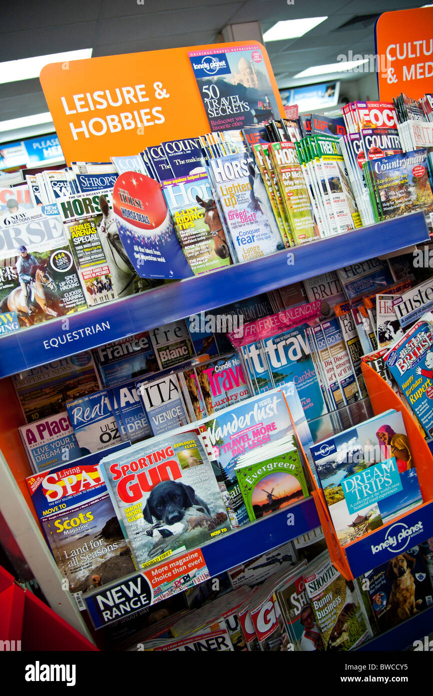 Shelves full of assorted UK weekly and monthly magazines and ...