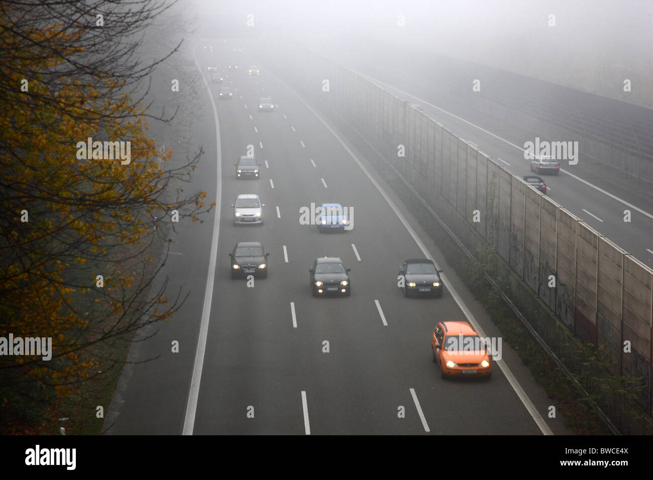 Autumn, thick fog, low visibility on a highway, autobahn. Essen ...