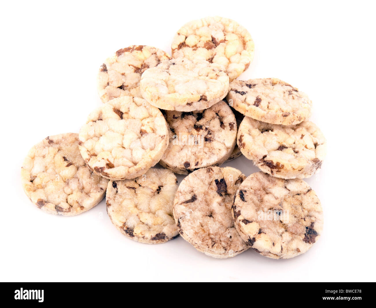 Small rice cakes on white background Stock Photo - Alamy