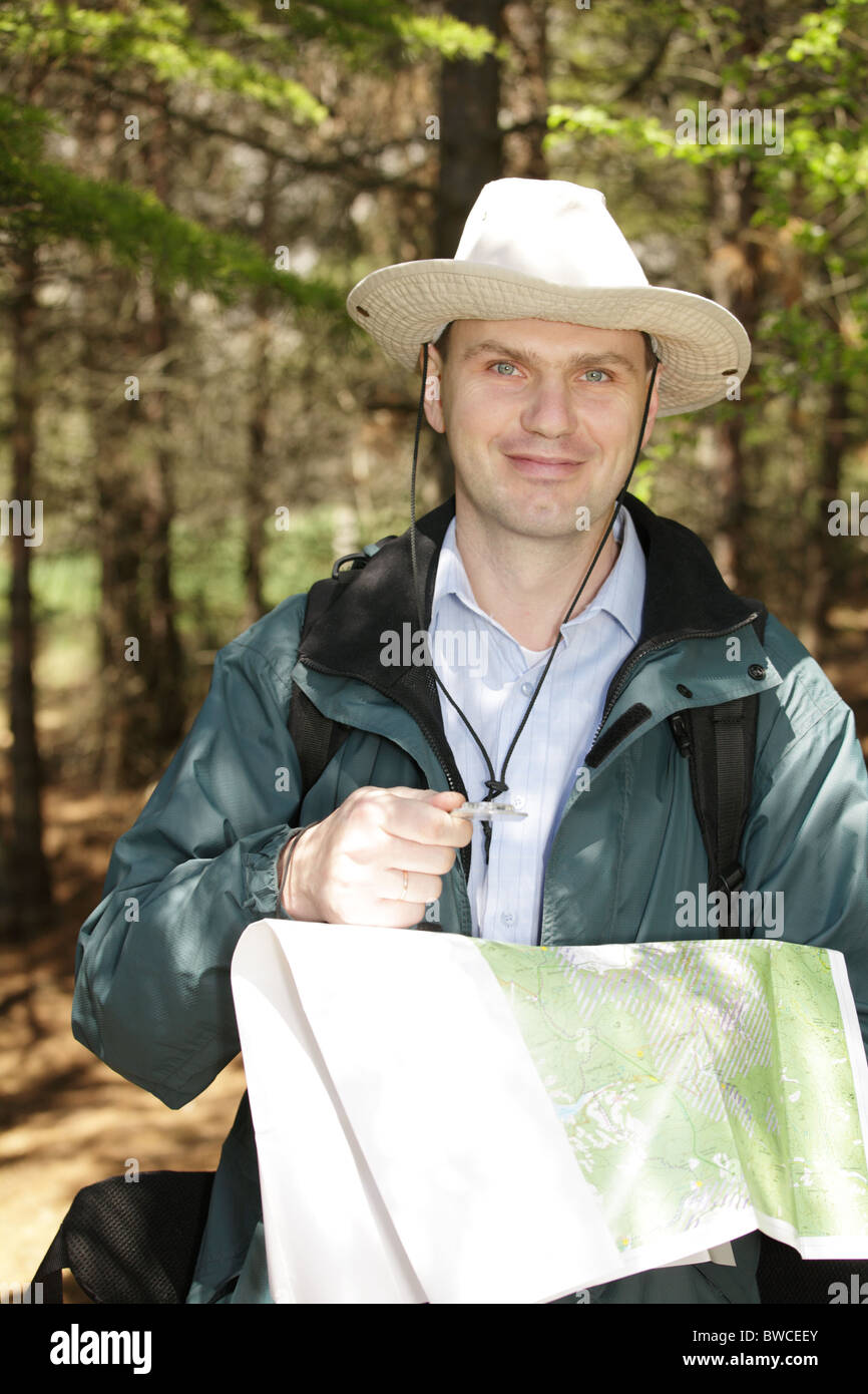 Hiker with the map Stock Photo - Alamy