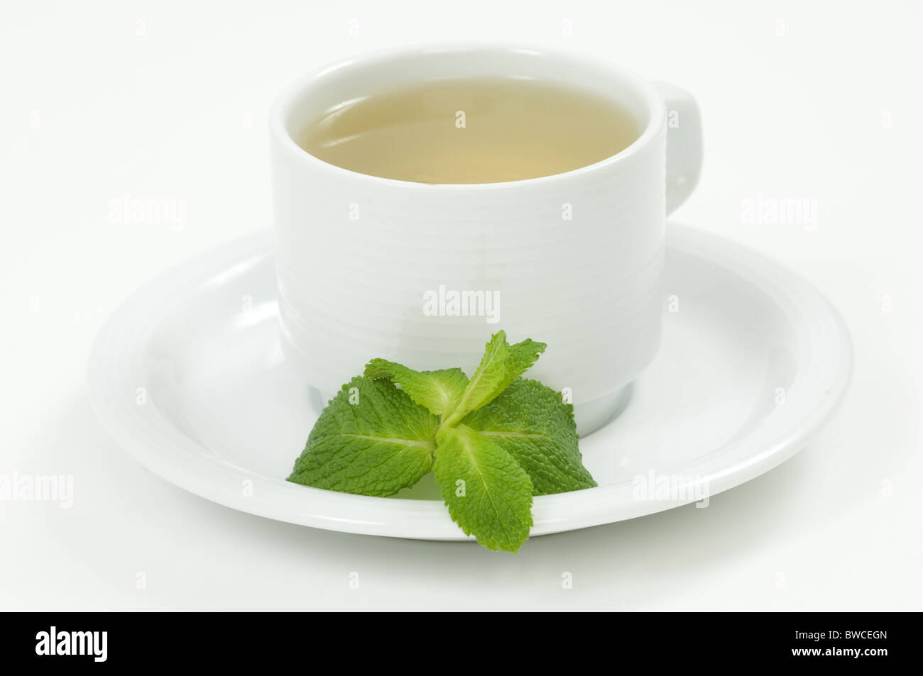 Cup of mint tea with fresh leaf Stock Photo - Alamy