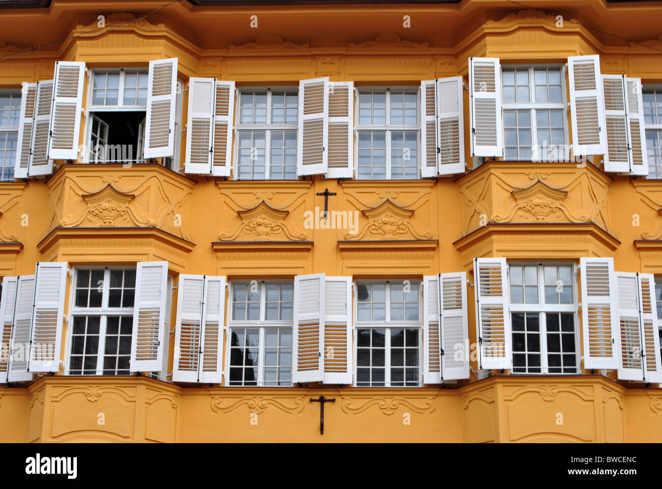 Tyrolean style house with windows and decorations Stock Photo - Alamy