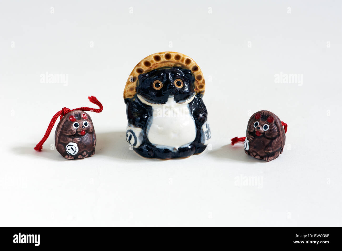 TANUKI, JAPANESE, RACCOON DOG, JAPAN, SCULPTURES, THREE TANUKI Stock ...
