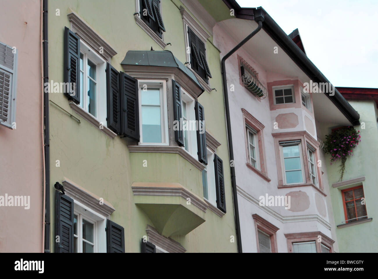 Tyrolean style house with windows and decorations Stock Photo - Alamy