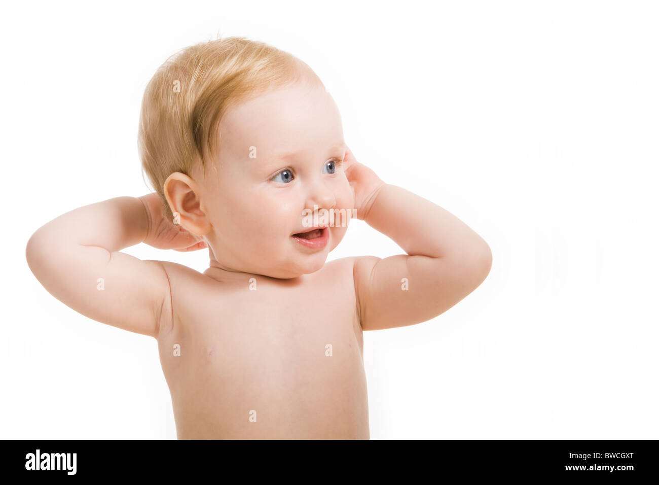 Photo of happy baby touching her head isolated on white background ...