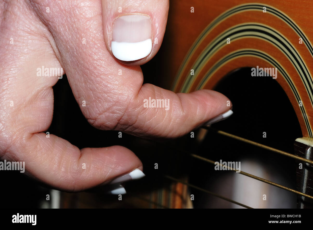 Fingers plucking strings hi-res stock photography and images - Alamy
