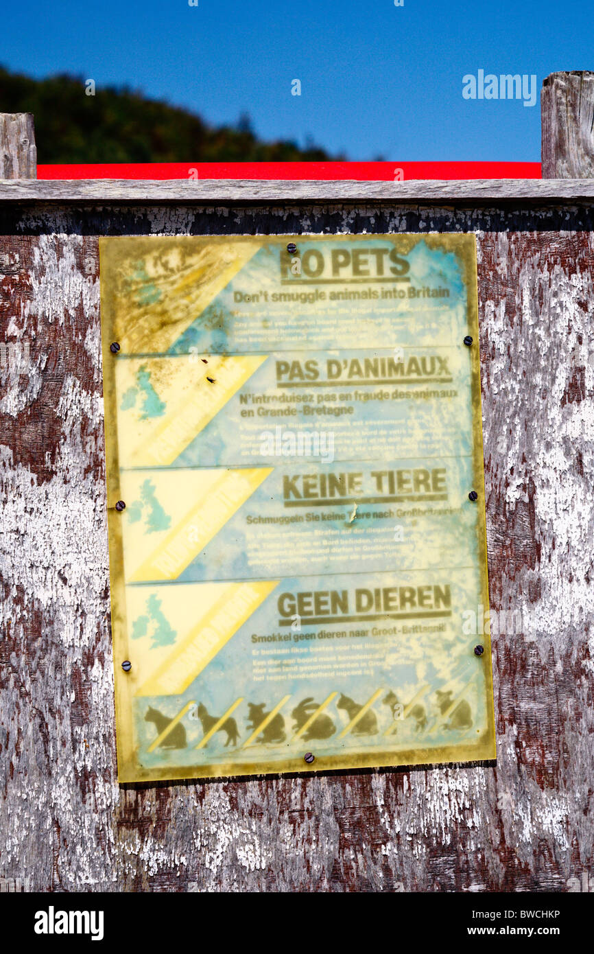 Faded warning sign about smuggling pets into Britain on the Isles of ...