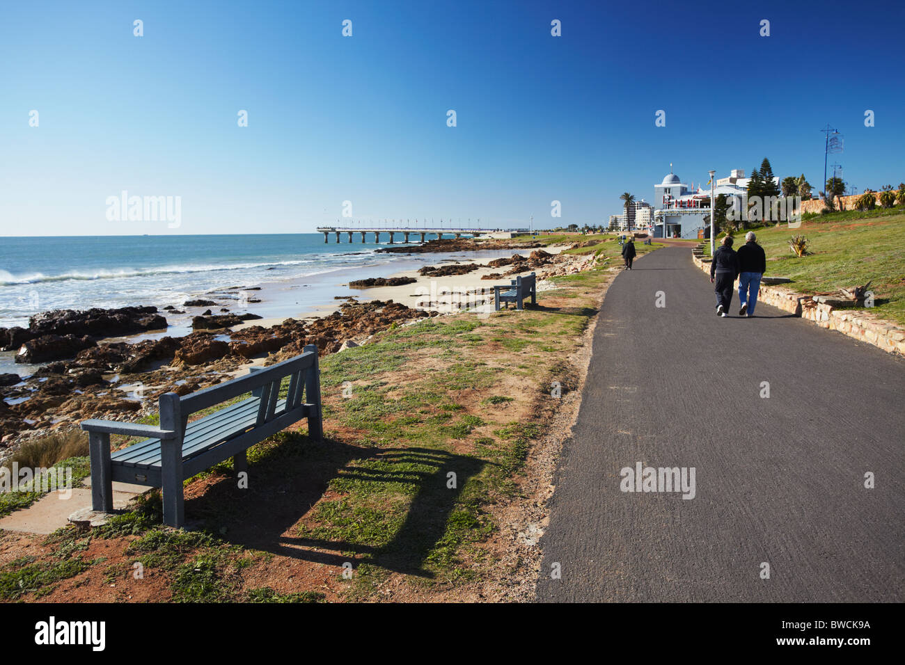Couple walking along Summerstrand beachfront, Port Elizabeth, Eastern ...