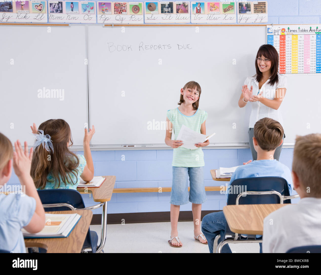 USA, Illinois, Metamora, Teacher and students (8-9) in classroom Stock ...