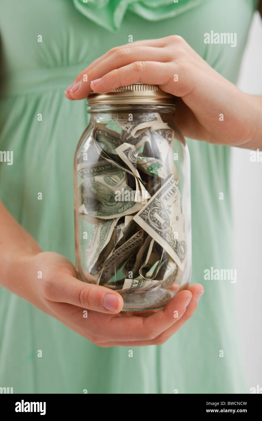 Money jar hi-res stock photography and images - Alamy