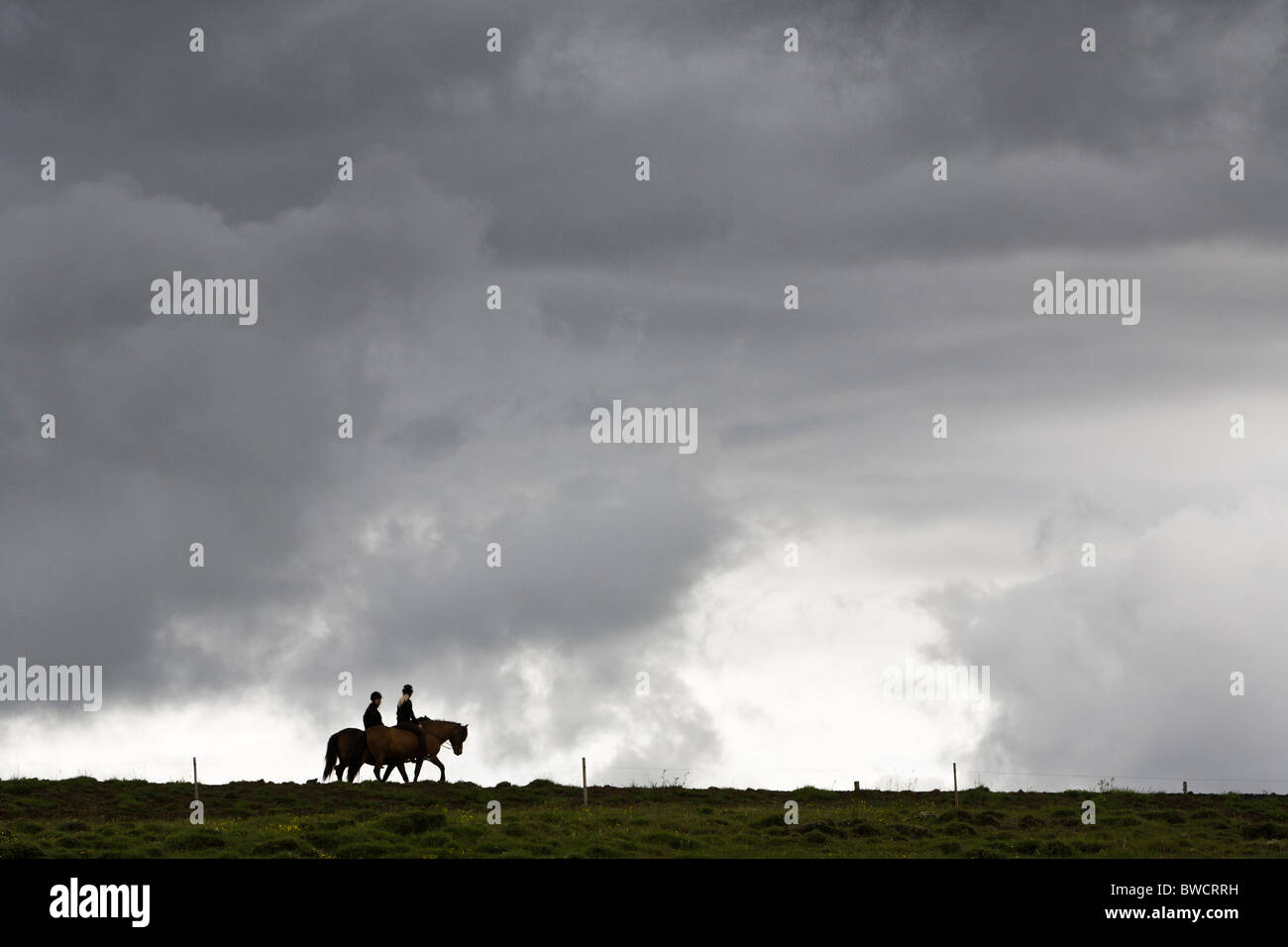 Two people horseback riding hi-res stock photography and images - Alamy