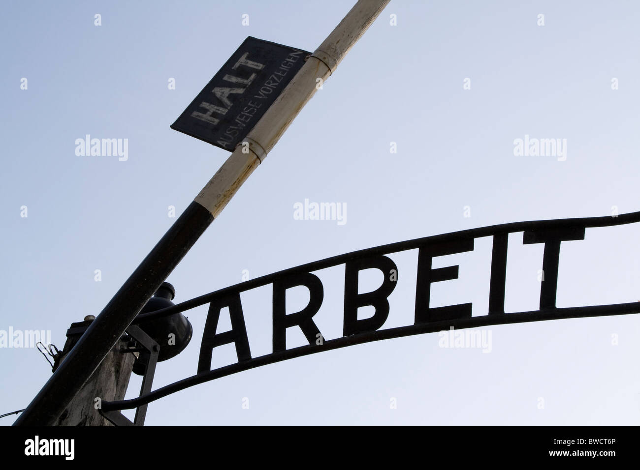 Auschwitz concentration camp gate with part of the famous label 'Arbeit ...