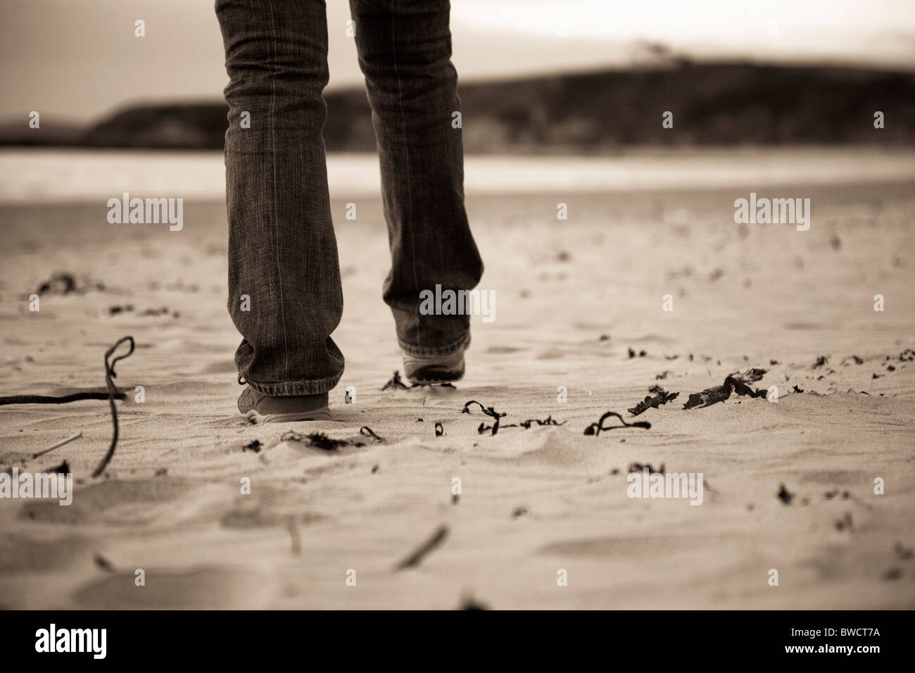 Walking across sand Stock Photo - Alamy