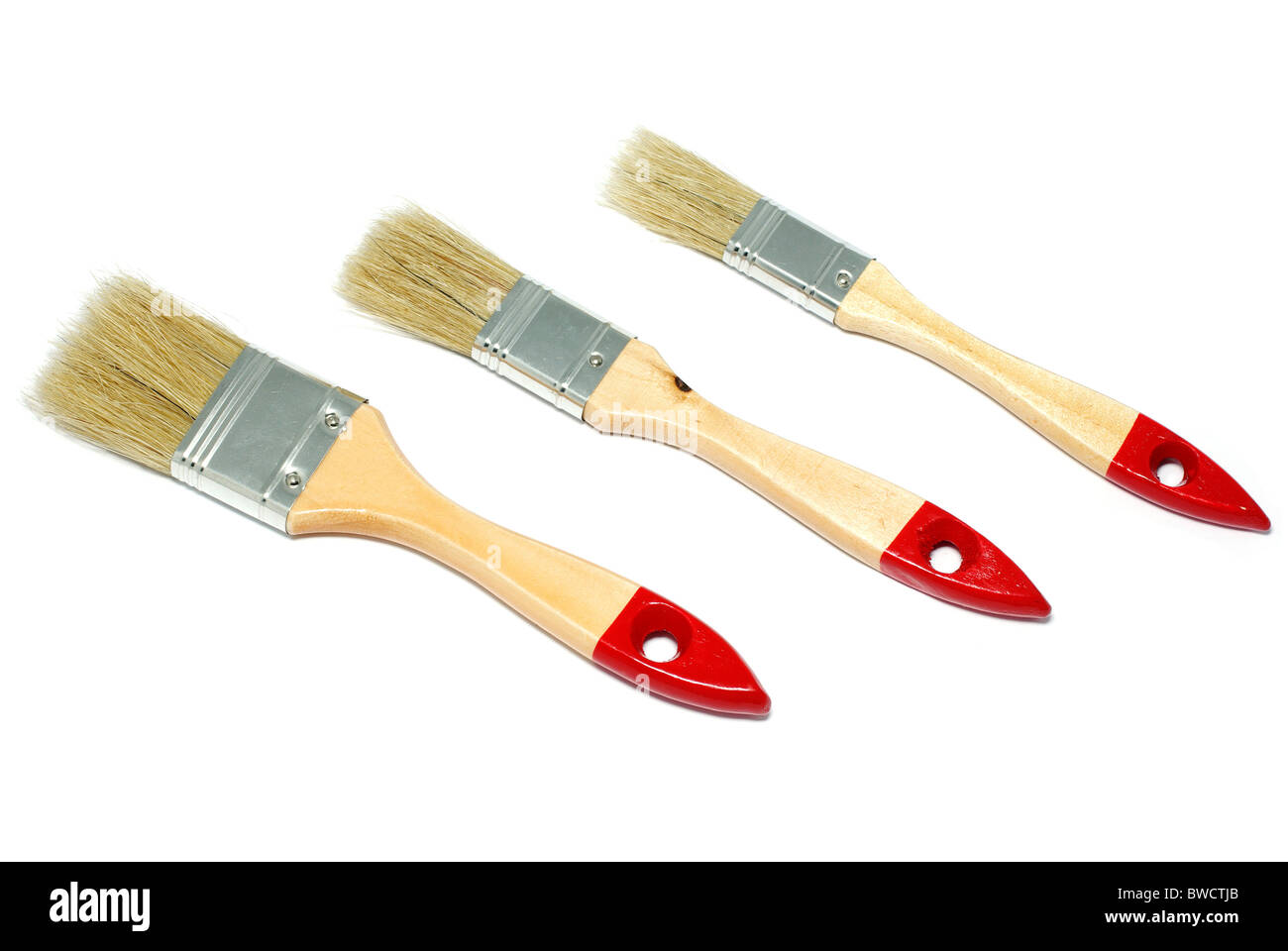 Three different brushes isolated on white background Stock Photo - Alamy