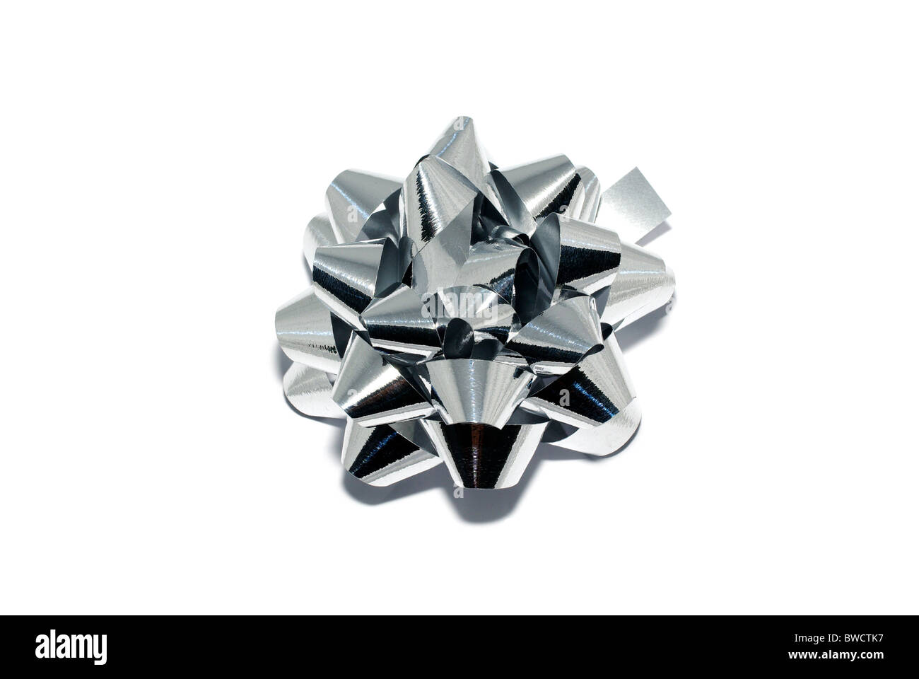 Silver shiny bow isolated on white background Stock Photo - Alamy