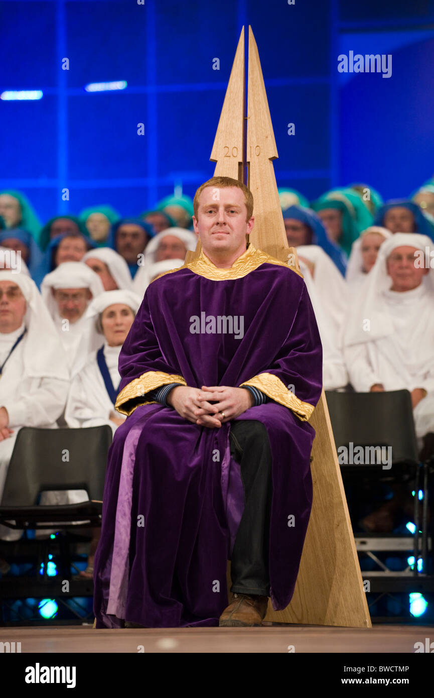 Chaired Bard Tudur Hallam on stage during a ceremony at the National ...