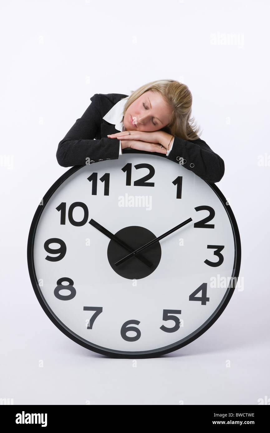 Large clock woman hi-res stock photography and images - Alamy
