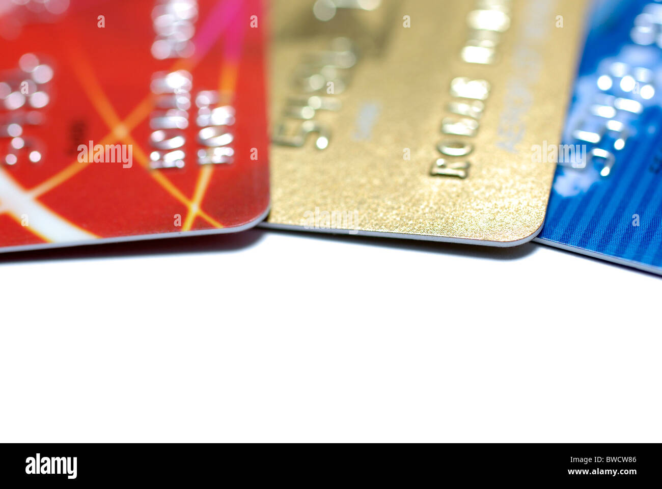 Three credit cards isolated on white background Stock Photo - Alamy