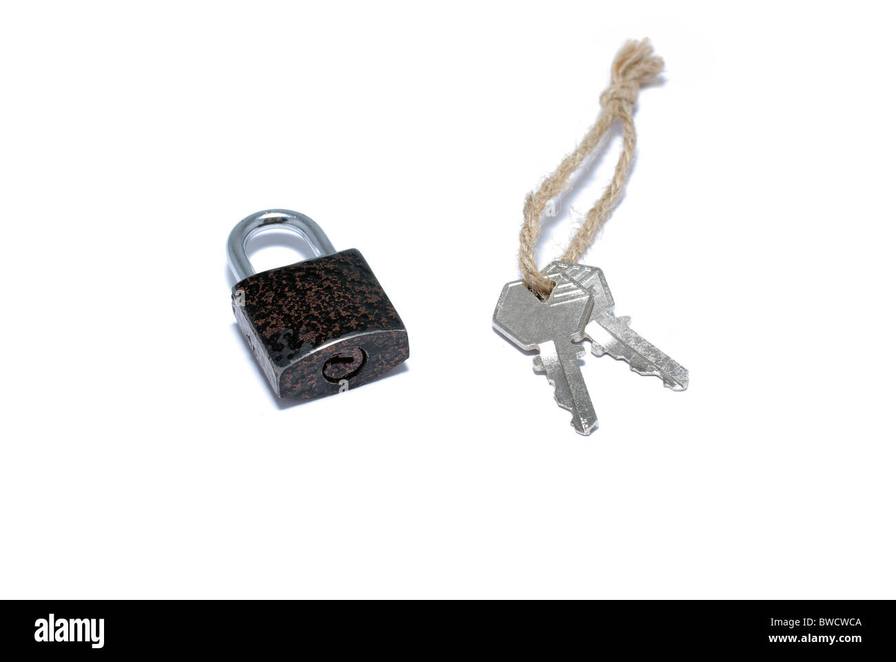 Padlock with keys isolated on white background Stock Photo - Alamy