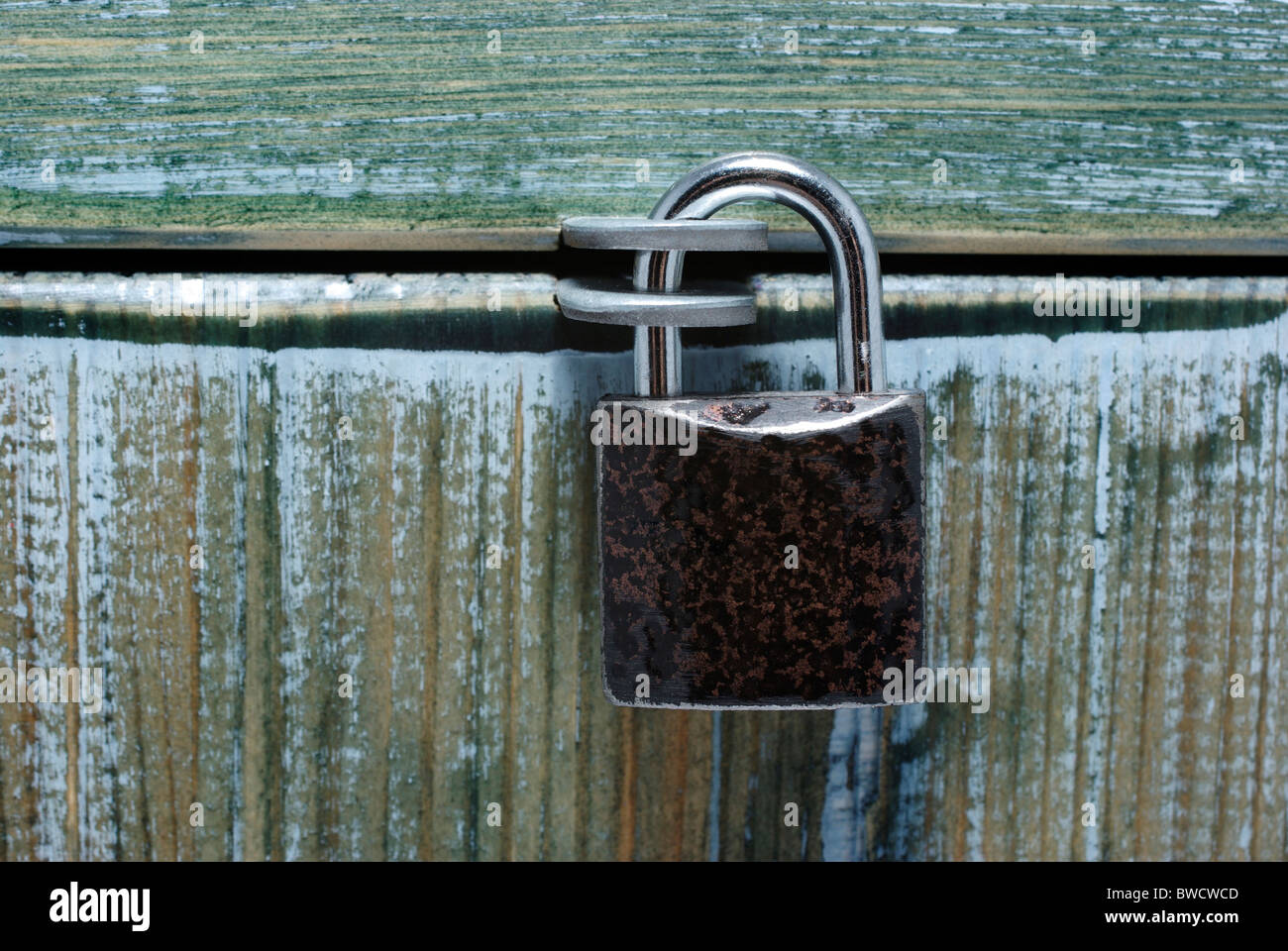 Padlock and closed painted old style box. Can be used as background or ...
