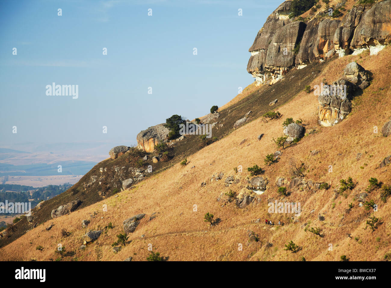 People hiking in Monk's Cowl Nature Reserve, Ukhahlamba-Drakensberg ...