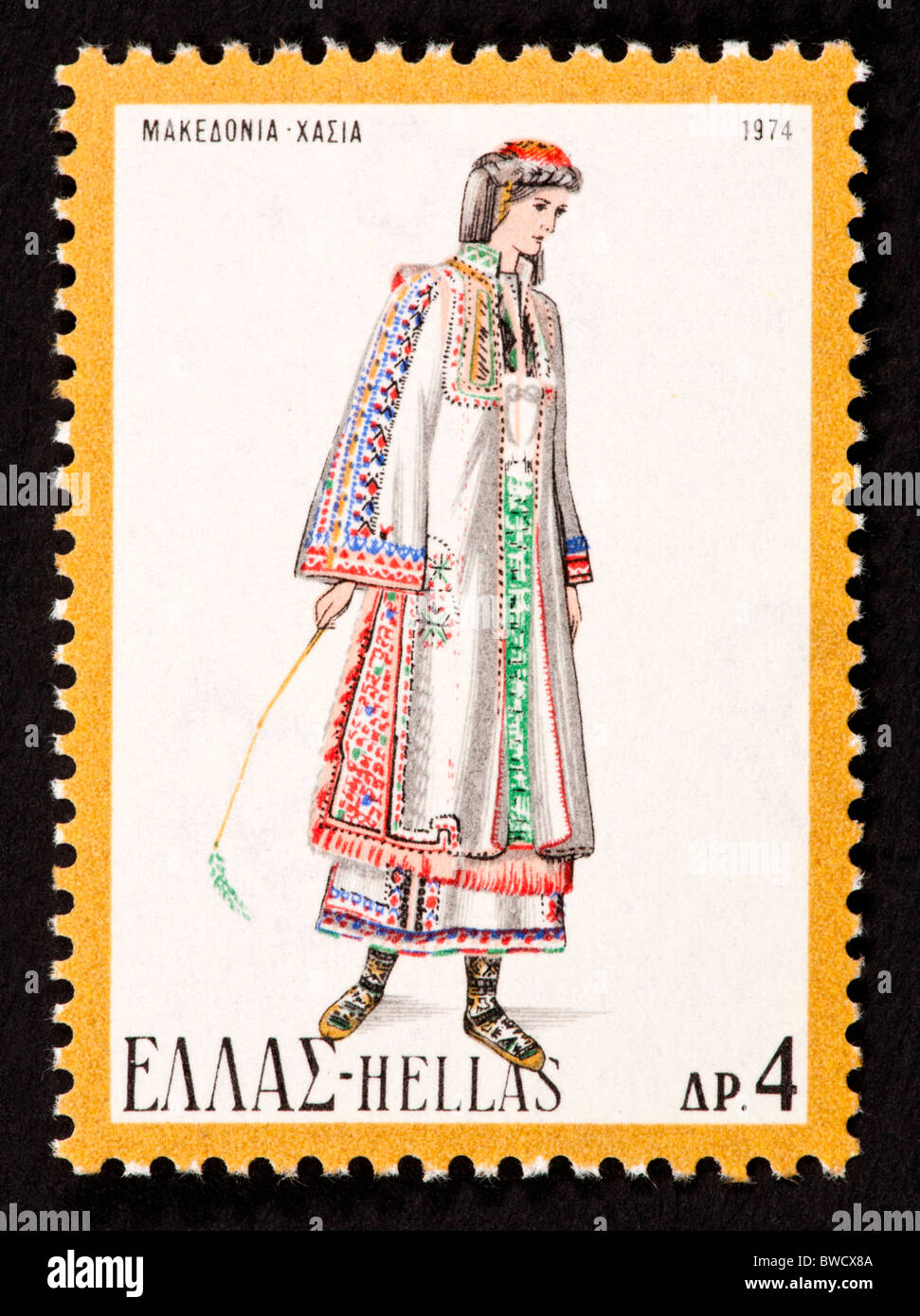 Postage stamp from Greece depicting woman in local attire (Hasia Stock ...
