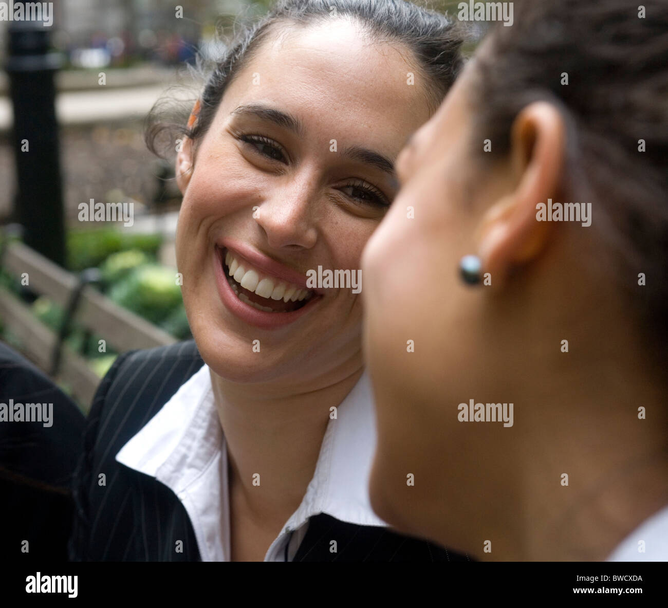 Two multi-ethnic business women (hispanic, mix and african-american mix ...