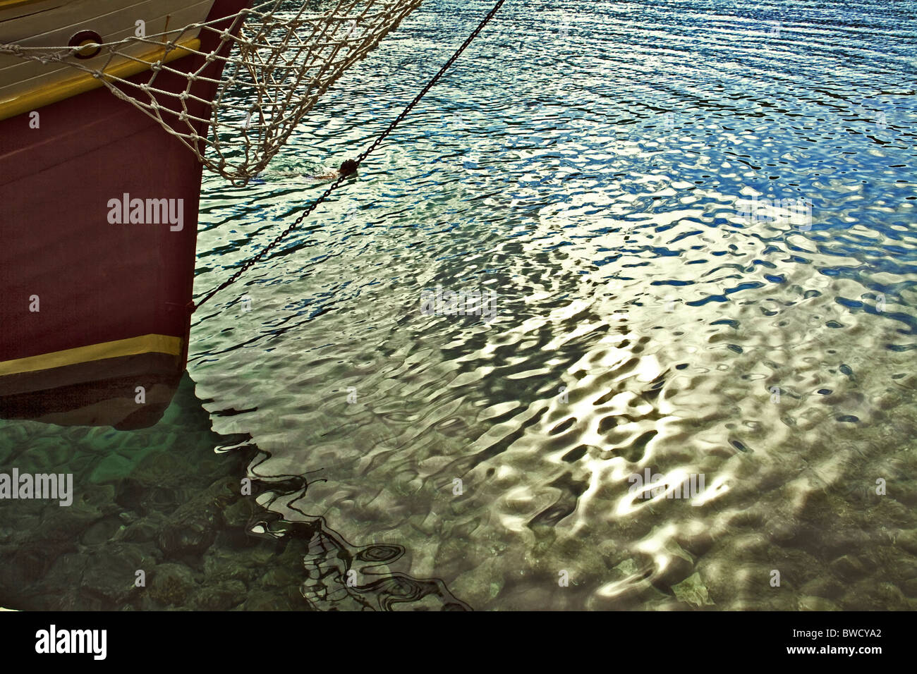 Going coastal, light reflections on sea surface and a prow Stock Photo ...