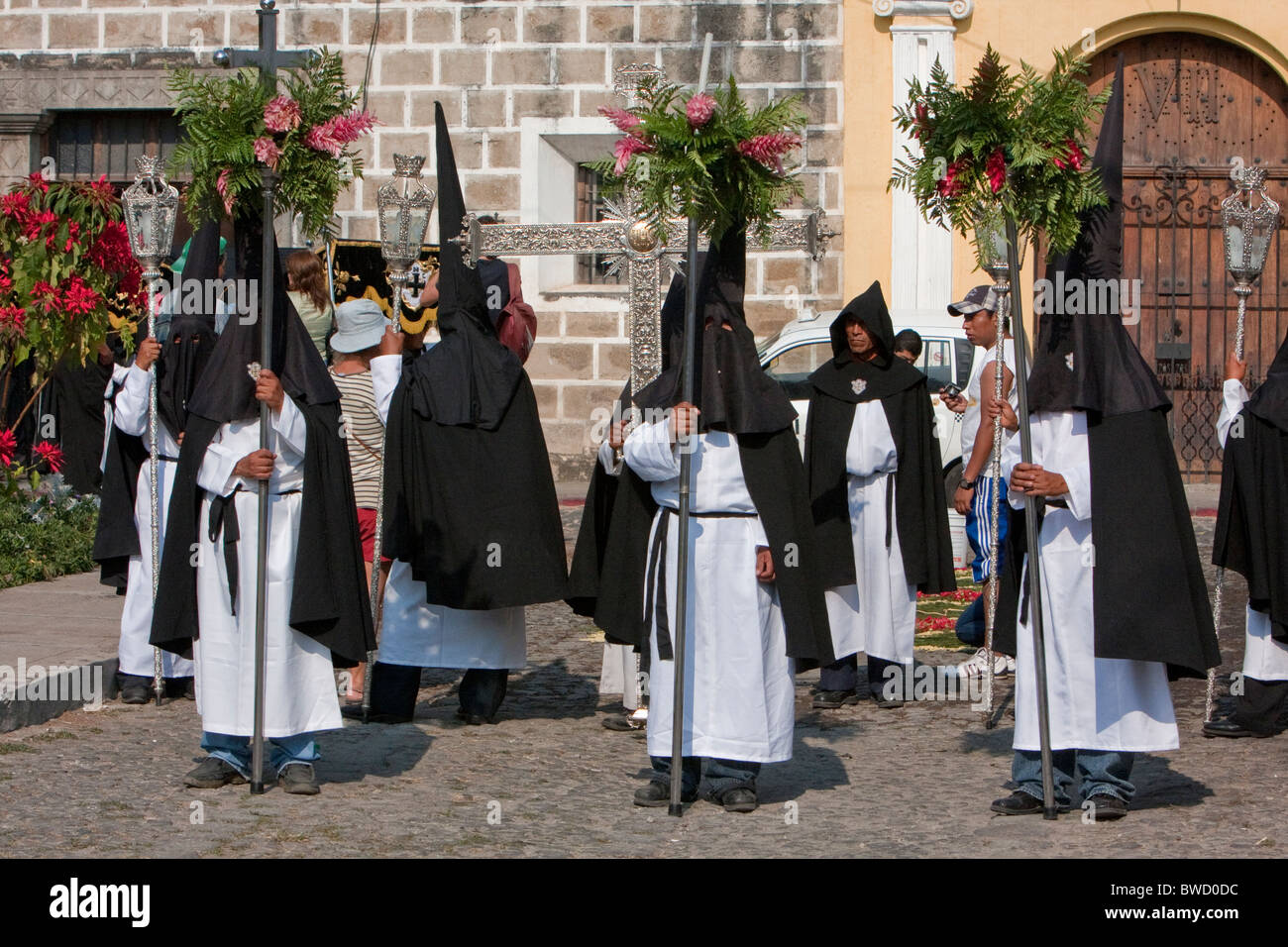 Antigua, Guatemala. Nazarenos wearing their Capuchas, a Black Conical ...