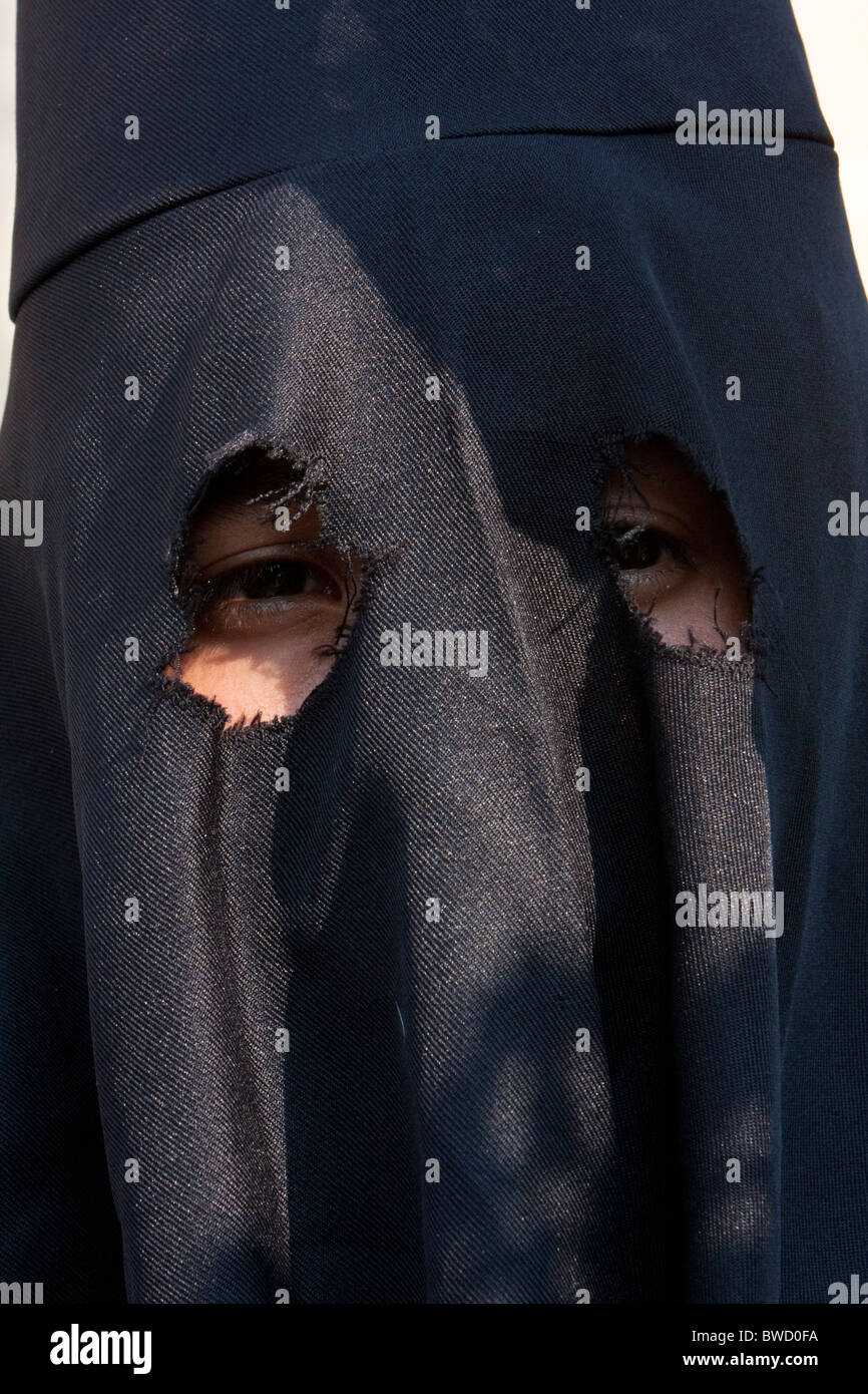 Antigua, Guatemala. A Nazareno wearing his Capucha, a Black Conical ...