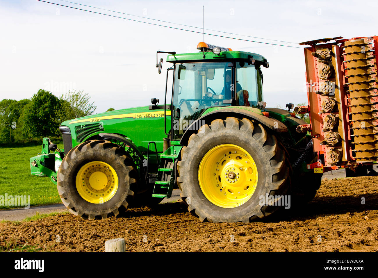 tractor on field, Normandy, France Stock Photo - Alamy