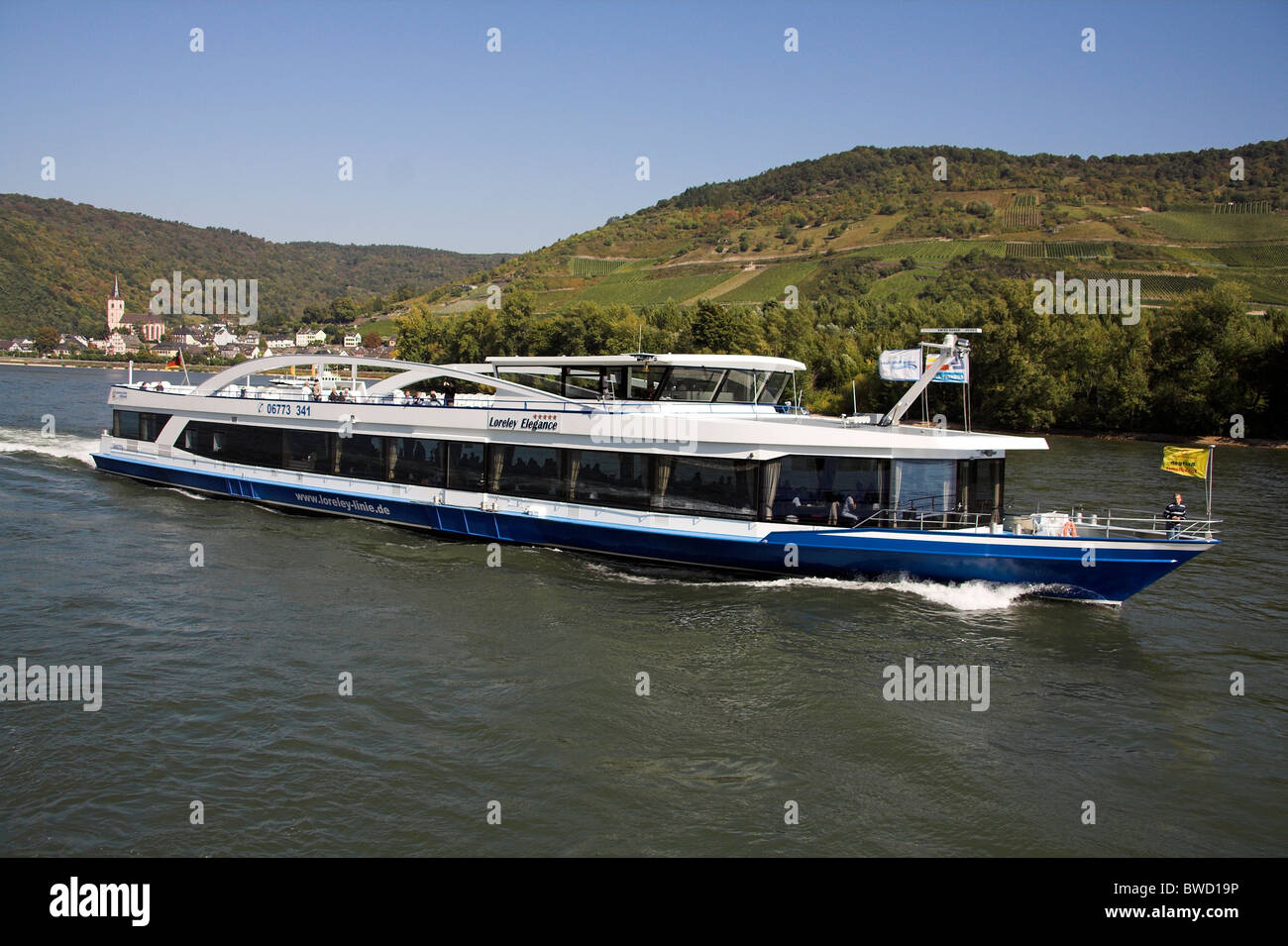 River cruise boat cruising on the Rhine River, near Lorch, Germany ...