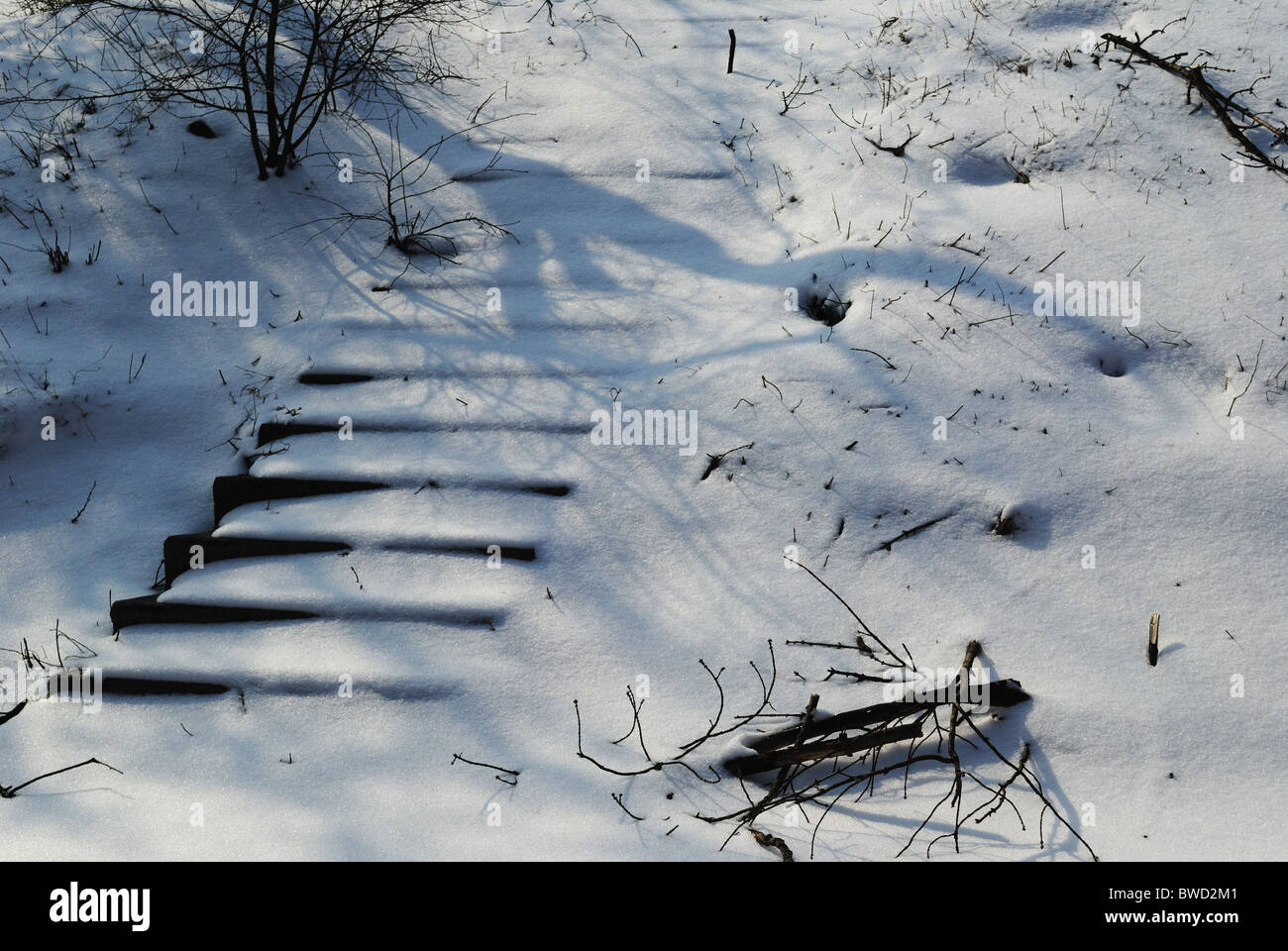 Winter still life with steps covered in snow Stock Photo - Alamy