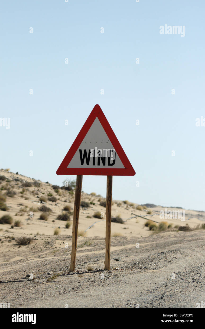 Road sign warnig against wind in the desert in Namibia Stock Photo - Alamy