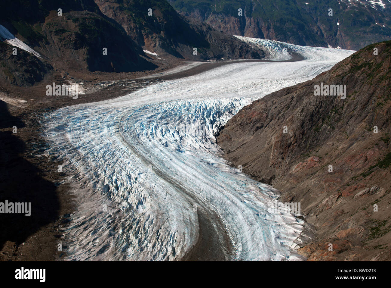 Salmon Glacier, southern Alaska. Ice flow between two large mountains ...
